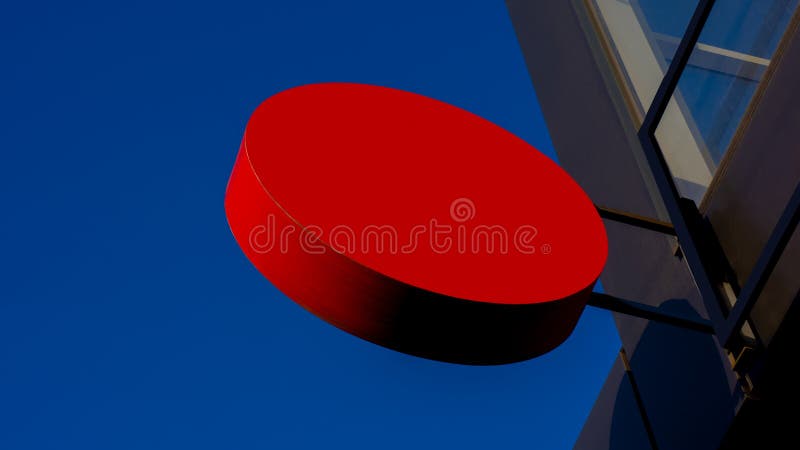 Red Advertising Sign Against the Backdrop of the Blue Sky Stock Image ...