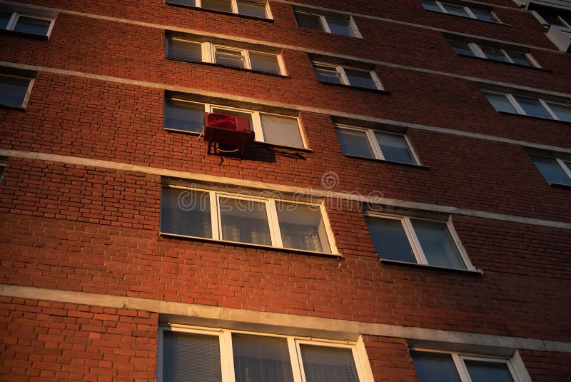 Red Air Conditioner on the Facade of a Brick Building Stock Image ...