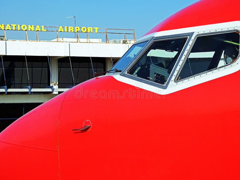 Red aircraft at an airport stock photo. Image of cockpit - 82827308