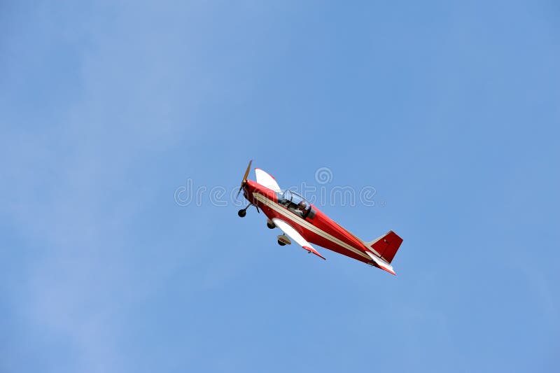Red Airplane in the Blue Sky with Clouds Stock Photo - Image of freedom ...