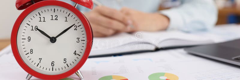 Red Alarm Clock on Documents in the Office, Woman is Blurry Stock Image ...
