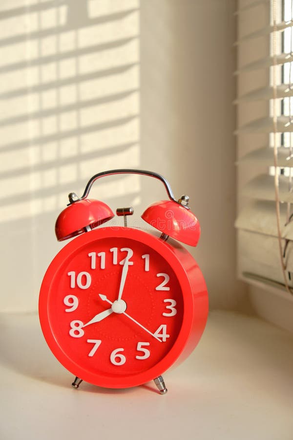 Red Alarm Clock Early Morning Windowsill in Rays Sun Stock Image ...