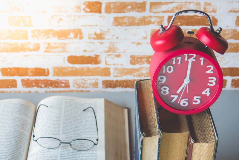 Red Alarm Clock with Open Book , Concept Education. Stock Image - Image ...