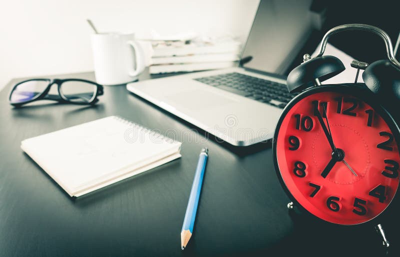 Red Alarm Clock on Student Working Desk Stock Photo - Image of ...