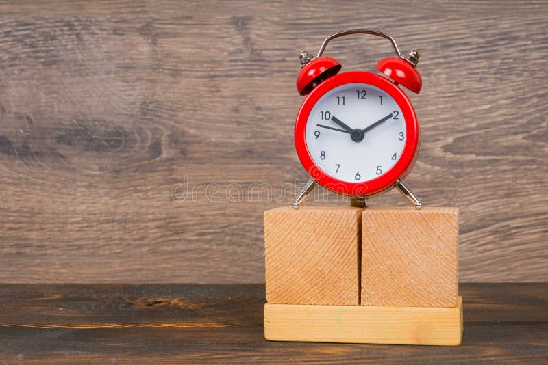 Red Alarm Clock with 2 Wooden Toy Blocks Stock Photo - Image of hello ...