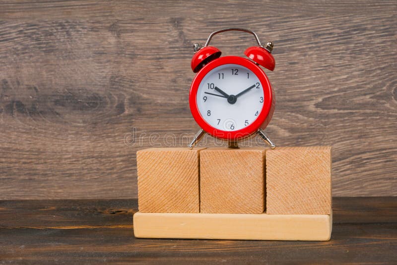 Red Alarm Clock with 3 Wooden Toy Blocks Stock Image - Image of hour ...