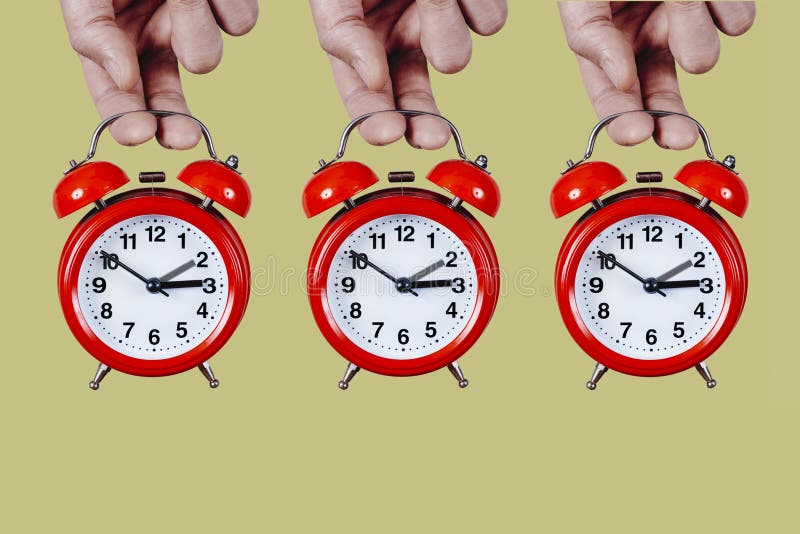 Red Alarm Clocks Setting Backwards or Forwards Stock Photo - Image of ...