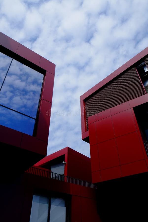 Red Aluminium Composite Facade Building with Blue Sky Stock Image ...