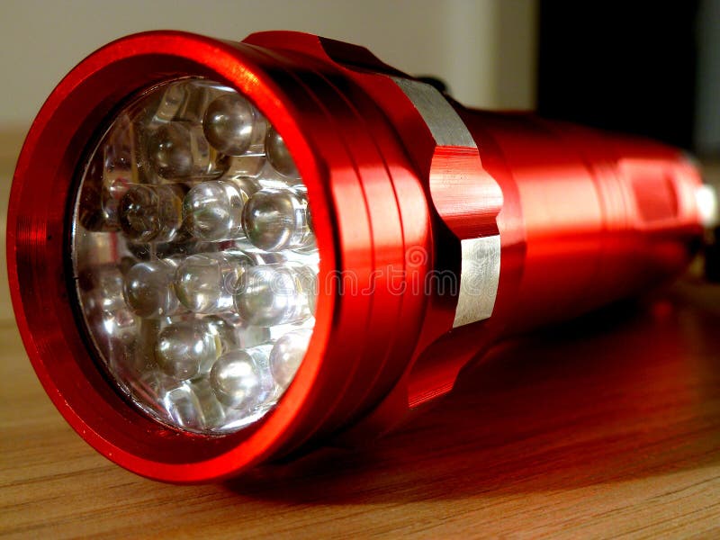 LED Flashlight in Closeup View. Red Aluminum Casing. Stock Photo ...