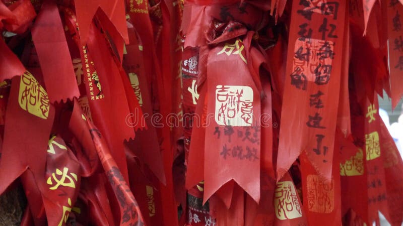 Red Amulet Wishing Prayer of Blessing Hanging on Wall and Trees ...