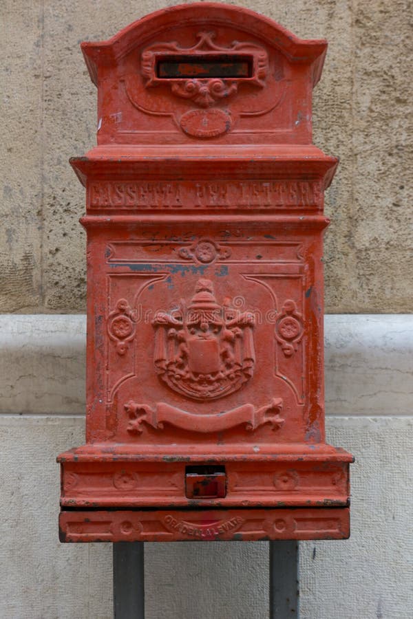 Red Ancient Letter Box in the City of Matera on Blur Background Stock ...