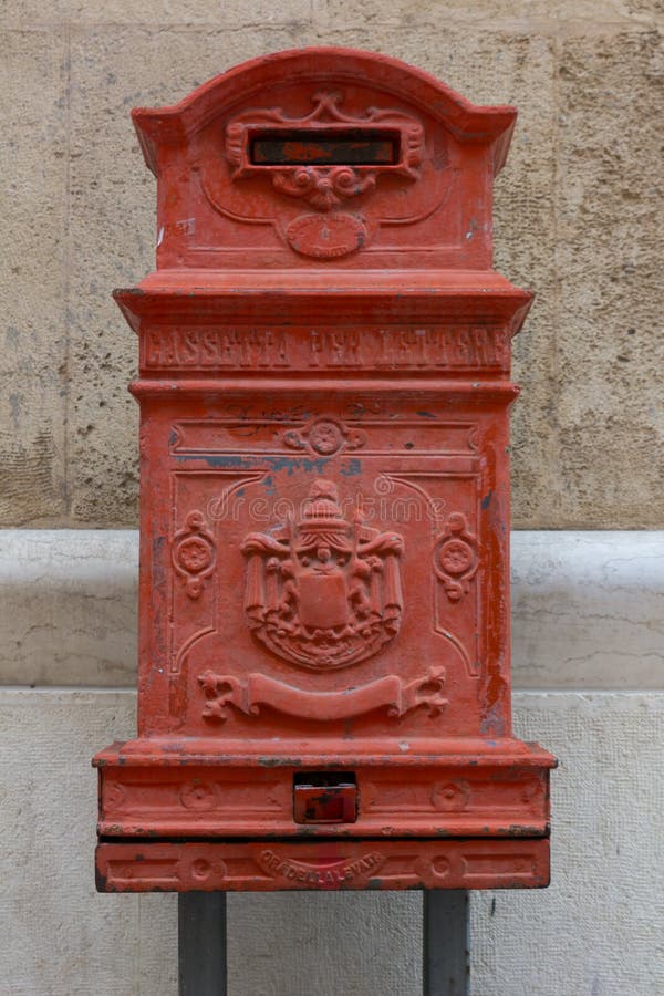 Red Ancient Letter Box in the City of Matera on Blur Background Stock ...