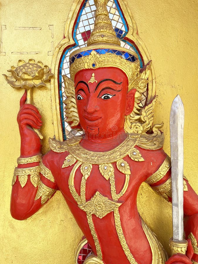 Red Angle Statue on Golden Wall Stock Image - Image of angel, texture ...