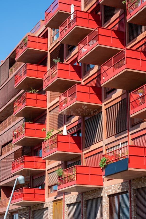 Red Apartment Building with Big Balconies Stock Image - Image of wall ...