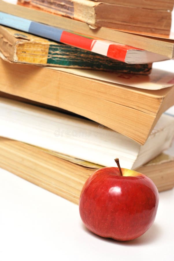 Red apple and books stock photo. Image of color, food - 19761320
