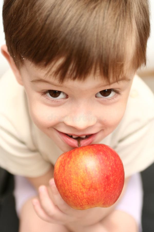 Red apple at the child stock photo. Image of fruit, apple - 2818868
