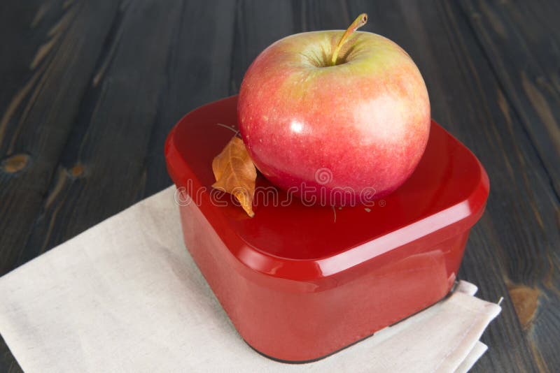 Red Apple and a Closed Box for School Lunch Stock Photo - Image of ...
