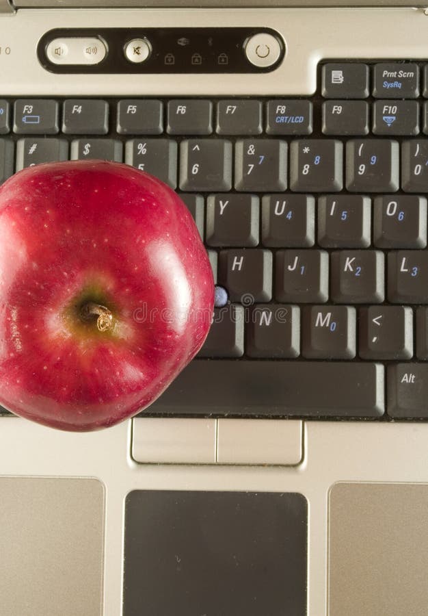Red apple with computer stock image. Image of network - 3413747