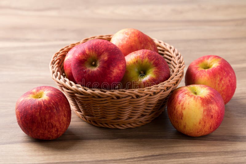 Red Apple Fruit (Envy Apple) in Basket on Wooden Background Stock Photo ...