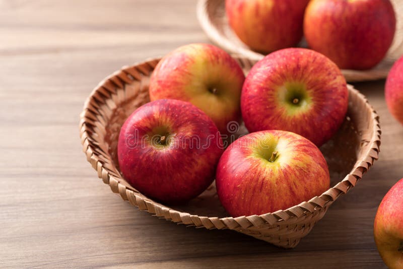 Red Apple Fruit (Envy Apple) in Basket on Wooden Background Stock Photo ...