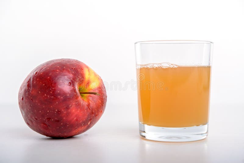 Red Apple with Glass of Naturally Cloudy Juice Stock Image - Image of ...