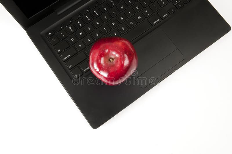Red Apple on Laptop stock photo. Image of book, laptop - 34791770