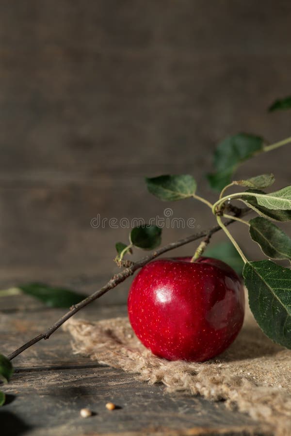 Red Apple with Leaves on Burlap on Wooden Boards Stock Photo - Image of ...