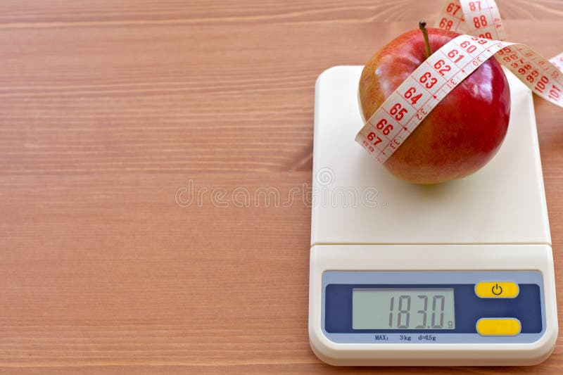 Red Apple with Measure Tape on Electronic Scale, D Stock Image - Image ...