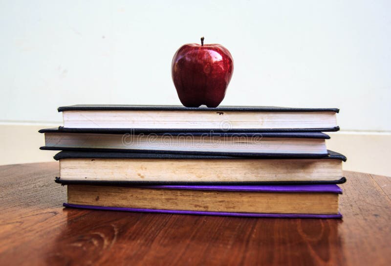 Red Apple and Old Books on Wooden Table Stock Photo - Image of read ...