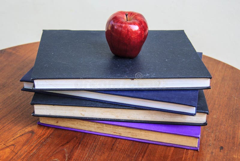 Red Apple and Old Books on Wooden Table Stock Photo - Image of read ...