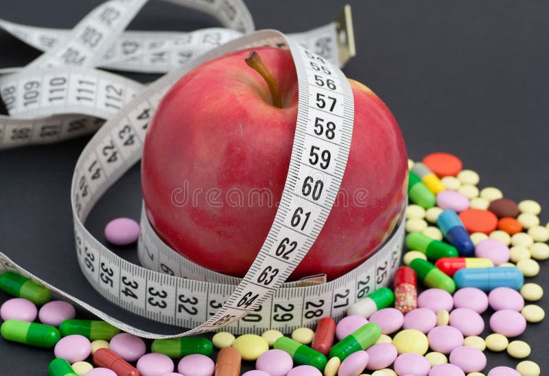 Red apple and pill stock image. Image of dietary, health - 19194891