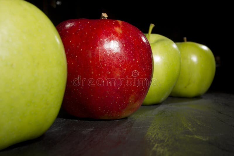 Red apple stands out stock photo. Image of atypical, searching - 96294852