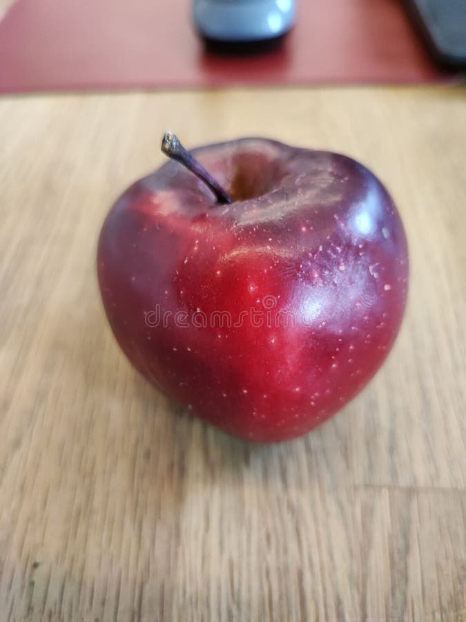 Red apple on the table stock image. Image of diet, apple - 267337483