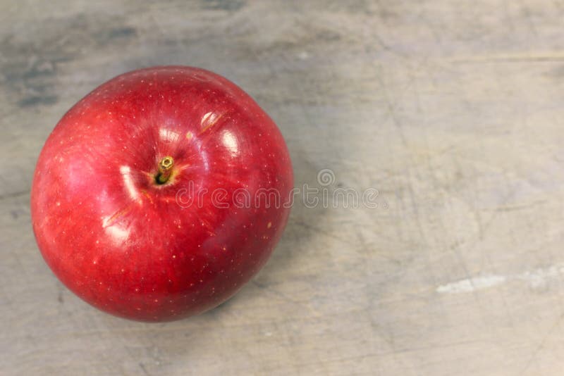 Red Apple on the Texture of the Board Stock Image - Image of fruit ...