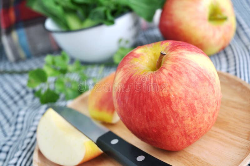 Red Apple on Tray with Knife Stock Photo - Image of snack, cutting ...