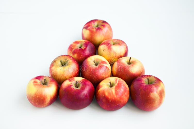 Red Apples in the Form of Pyramid. Apples Isolated on the White ...