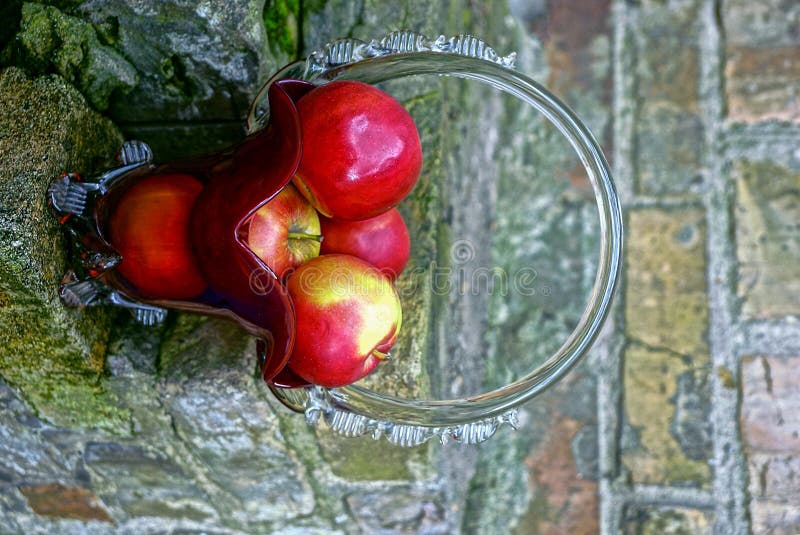 Red Apples in a Glass Vase on a Brick Wall Background Stock Photo ...