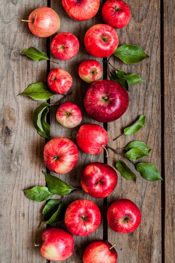 Red Apples on Old Wood Background Stock Photo - Image of organic ...