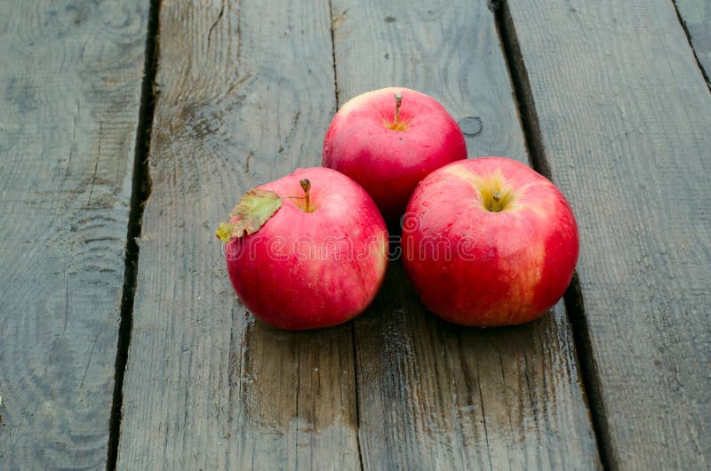 Red apples on old wood stock image. Image of freshness - 39136755