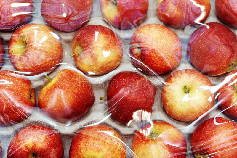 Red Apples in Plastic Packaging. Export of Fresh Fruits To Different ...