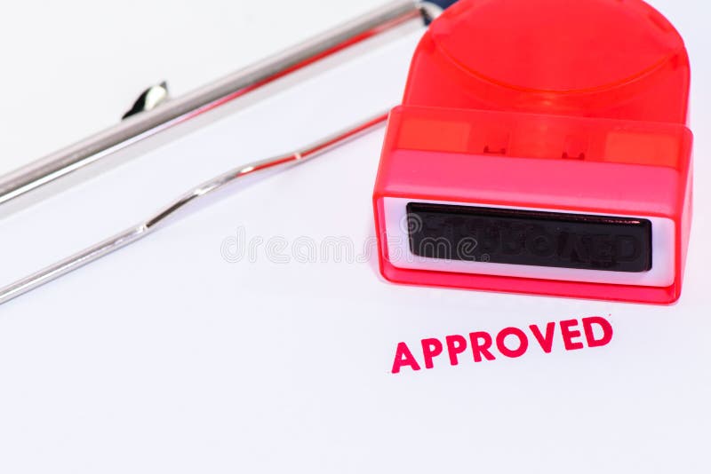 Red Approved Stamp on White Paper with Rubber Stamper and Clipboard ...