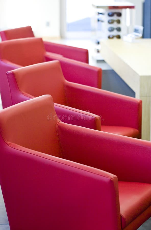 Red armchairs stock photo. Image of counter, eyewear - 10970162