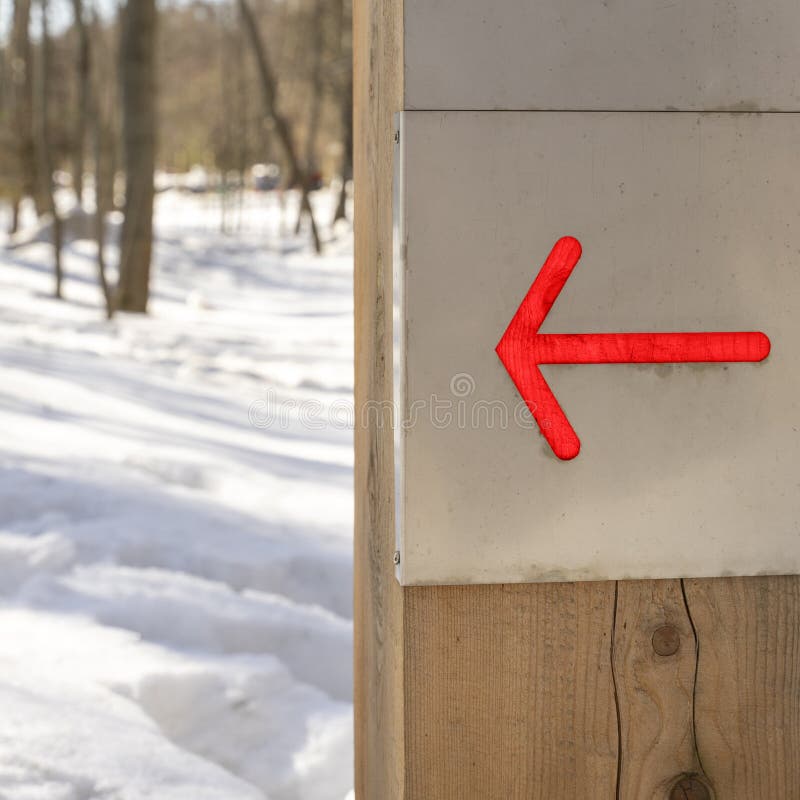 Red Arrow Pointer in Winter Park. Path Direction Stock Photo - Image of ...