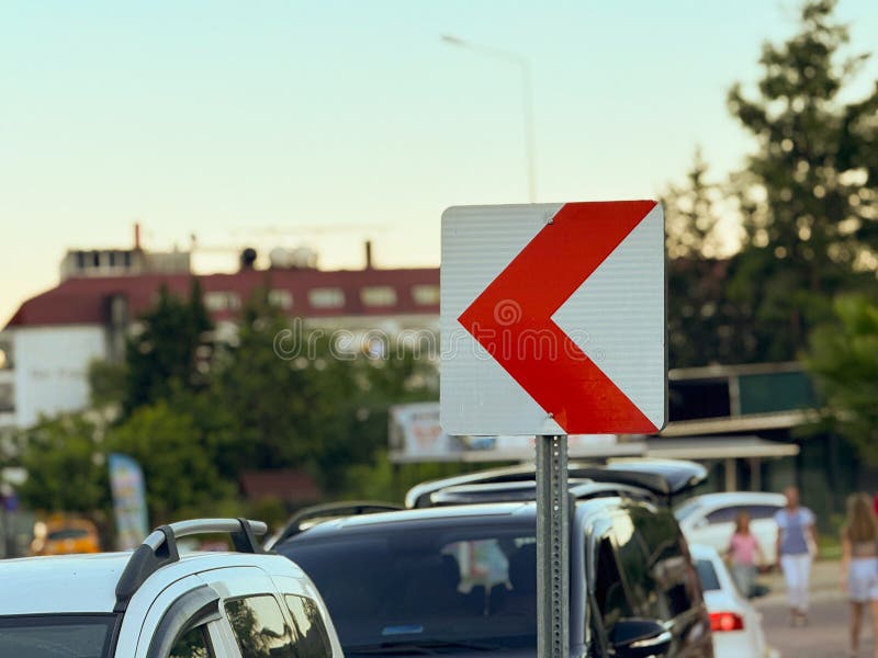 Red Arrow Traffic Sign on a Post. Road Safety, Direction and Urban ...