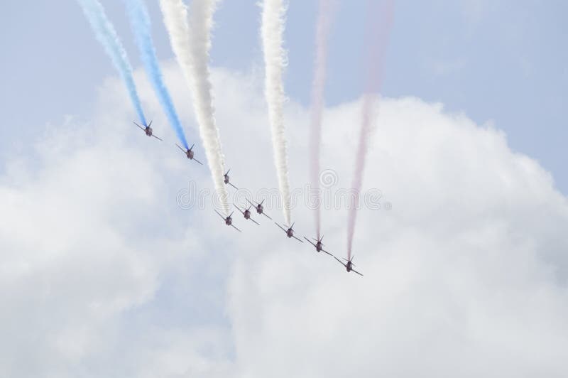The Red Arrows Flypast in UK Stock Image - Image of pilot, airshow ...