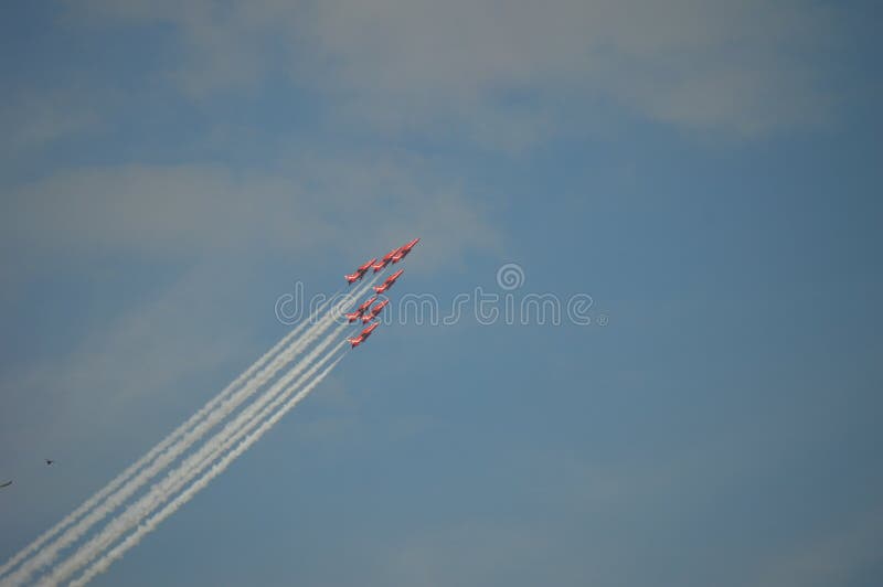 Red arrows stock image. Image of smoke, white, flying - 99176575