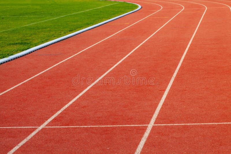 Red Athletic Running Track in Stadium. Rubber Coating Stock Photo ...