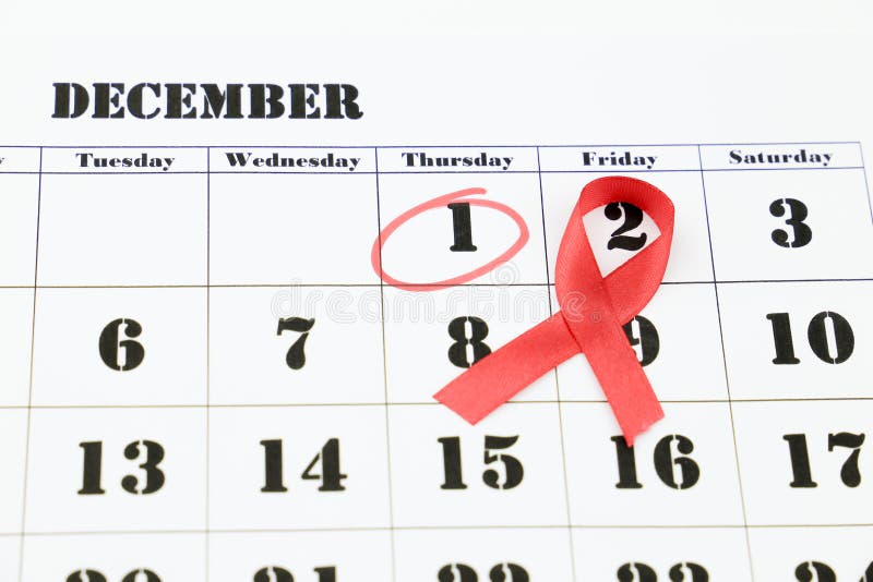 Red Awareness Ribbon on December Calendar Stock Photo - Image of ...