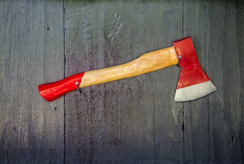 Red axe on the wall stock photo. Image of metal, lumber - 56103438