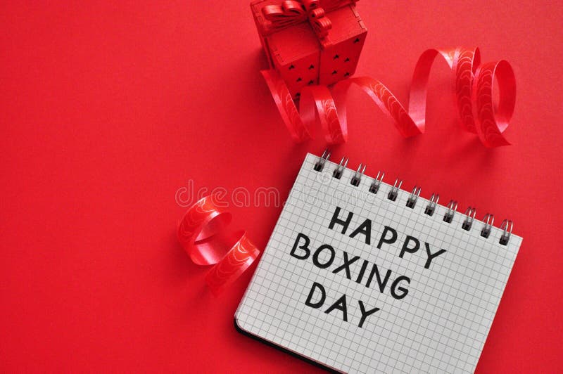 Red Background with Notebook with Happy Boxing Day Write Stock Photo ...